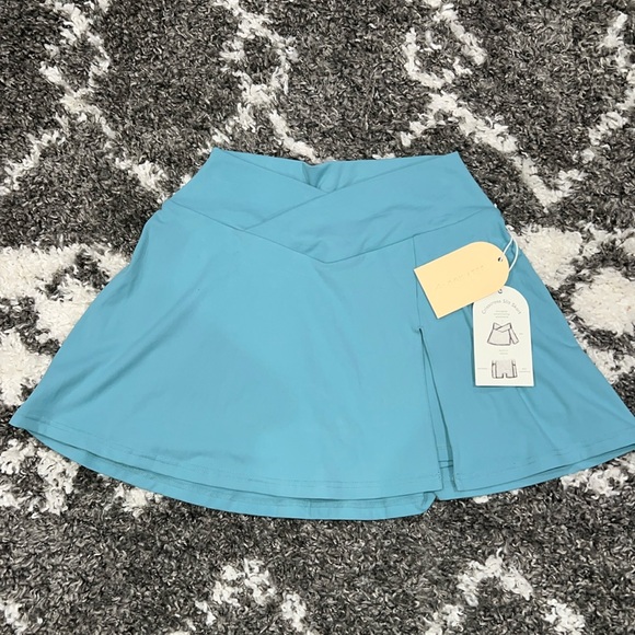 POPFLEX | Shorts | Nwt Popflex Blogilates Cameo Blue Crisscross Slit ...